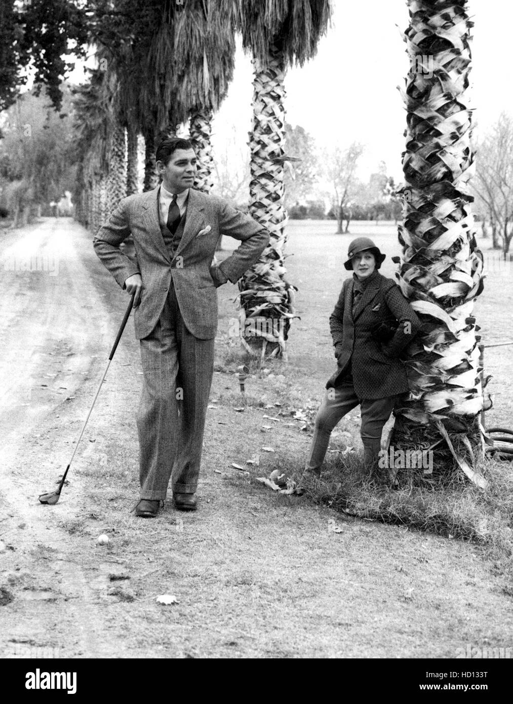CLARK GABLE and wife RHEA LANGHAM enjoy a game of golf, 12.19.32 Stock ...