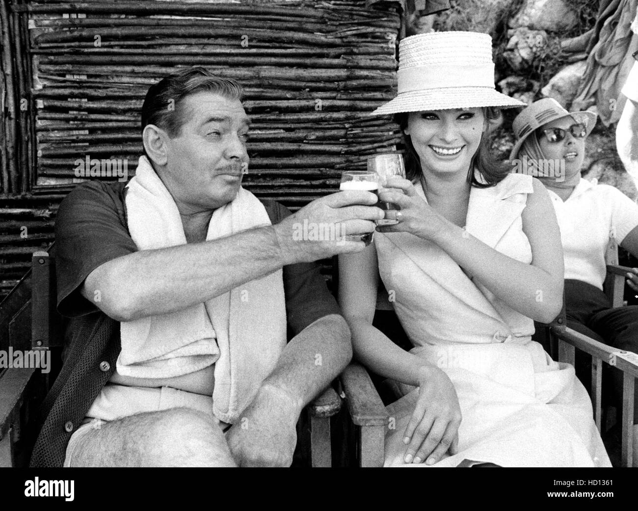 CLARK GABLE and SOPHIA LOREN relax on the set of IT STARTED IN NAPLES ...