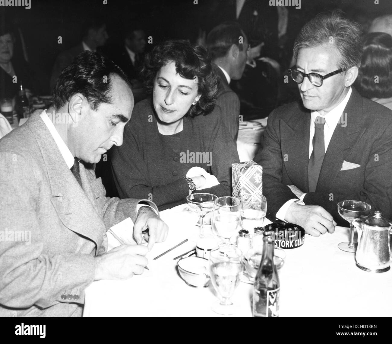 Director Irving Rapper (left) with Claude Rains (right) and his wife ...