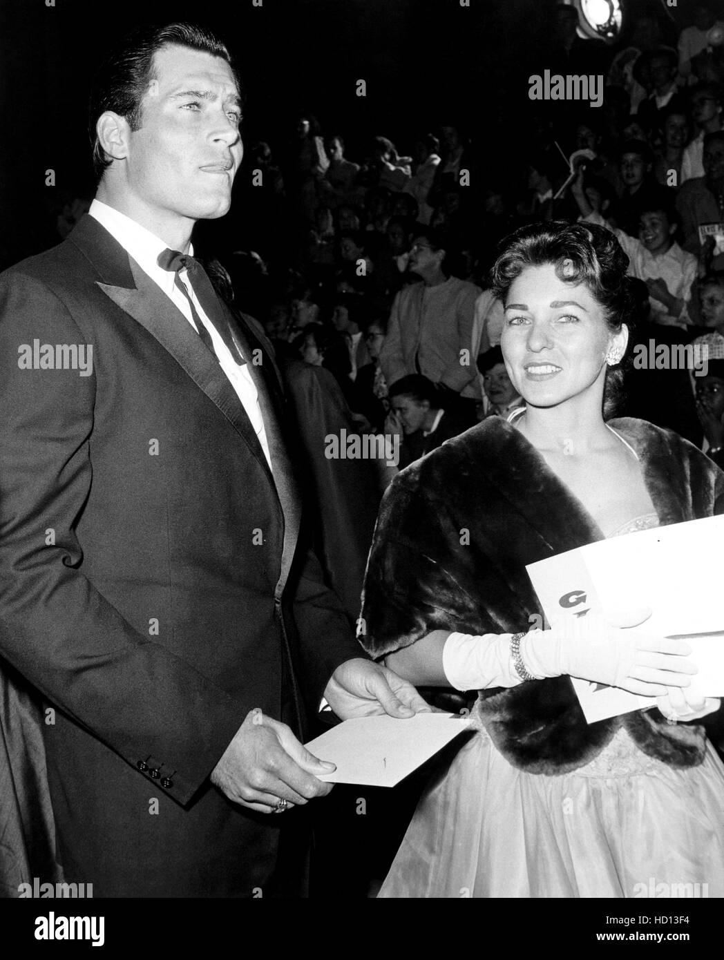 Clint Walker with wife, Verna Garver, attending premiere of 'GIANT,' 1956 Stock Photo - Alamy