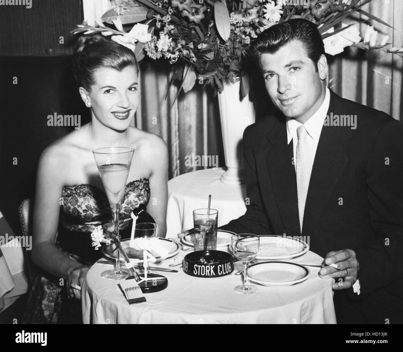 From left: Corinne Calvet, John Bromfield at the Stork Club, 1951 Stock ...