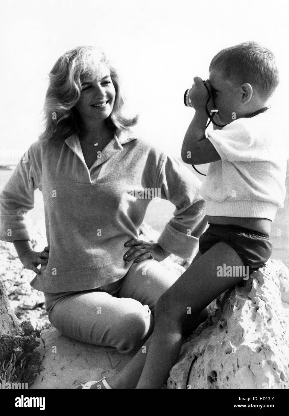 From left: Corinne Calvet posing for picture taken by her son Robin ...