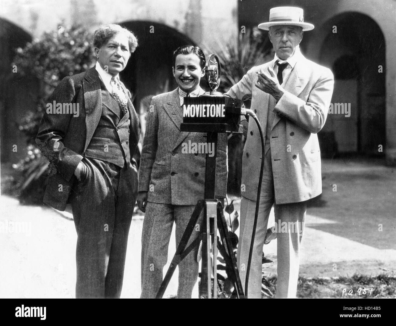 Sid Grauman, Carl Laemmle Jr., director D.W. Griffith, demonstrating ...