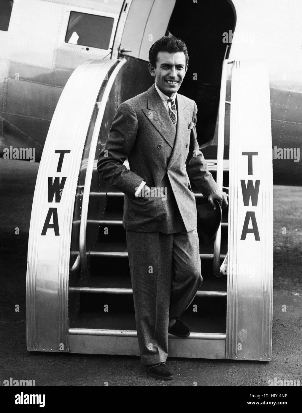 Eddy Duchin, arriving at Newark Airport to see his newborn son, Peter ...