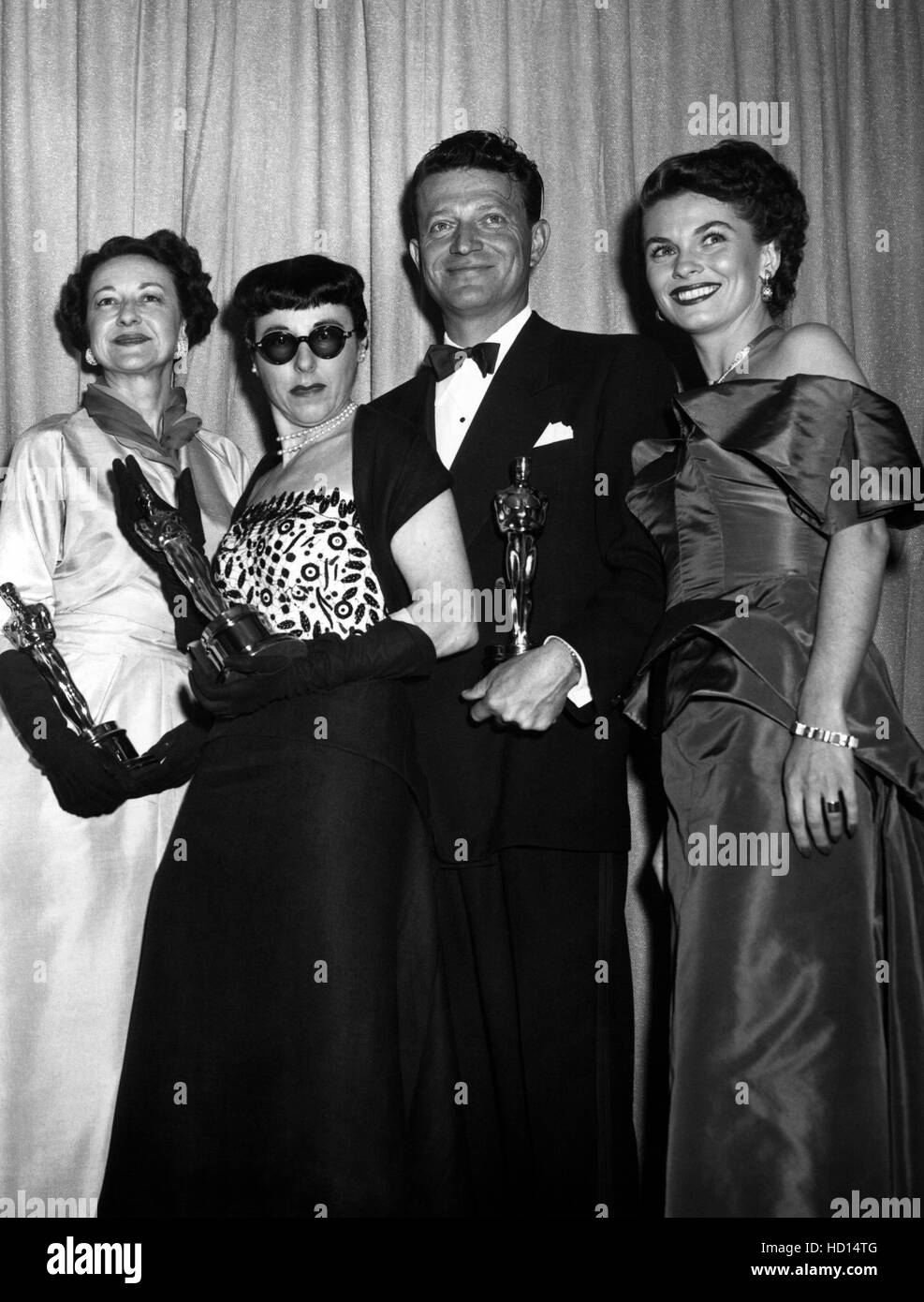 Leah Rhodes, Edith Head and Gile Steele are presented with Oscars by ...