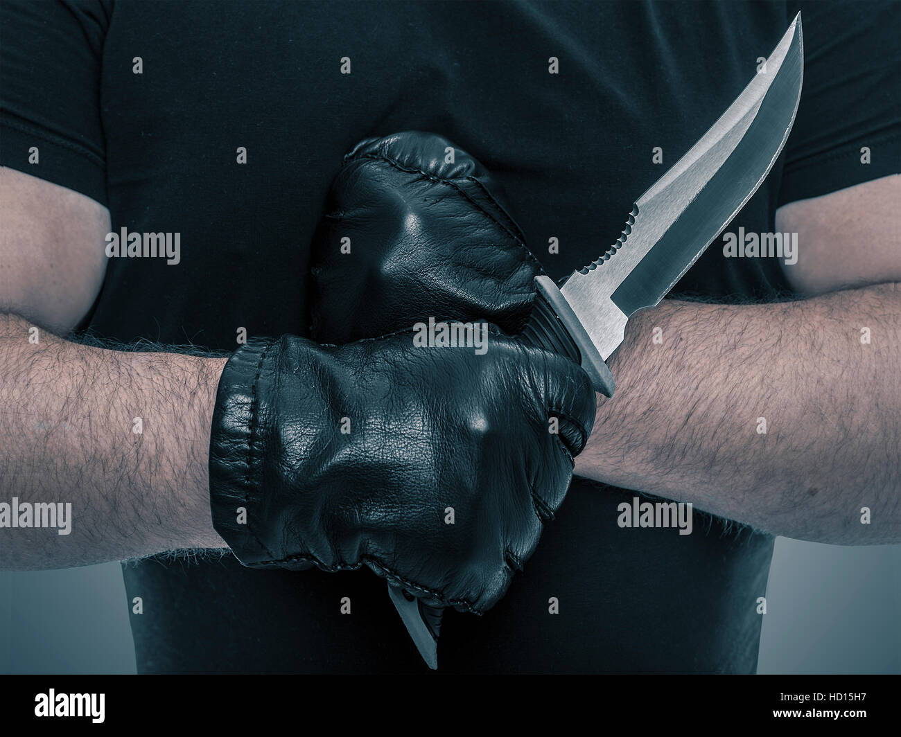 Man with knife in a hand Stock Photo - Alamy