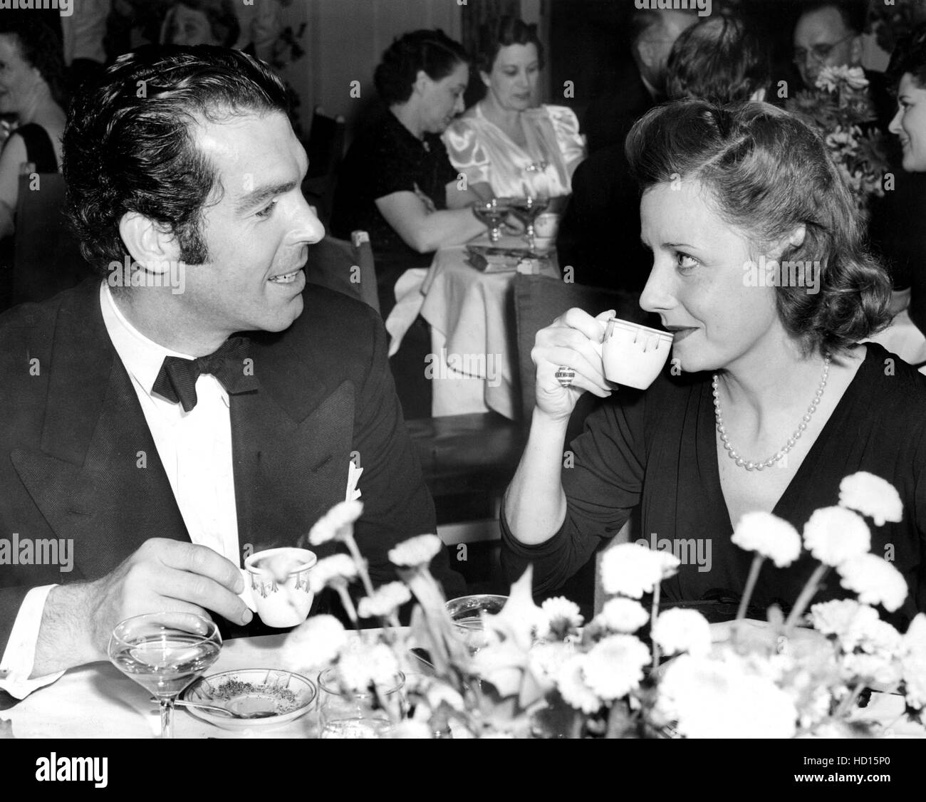 Fred MacMurray, Irene Dunne, at the Beverly Hills Hotel, 1939 Stock ...