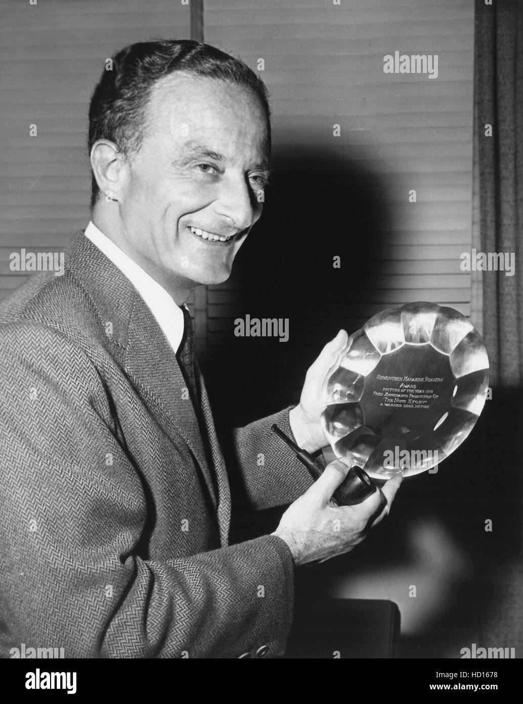 Fred Zinnemann holding his Seventeen Magazine Readers Award for Best ...