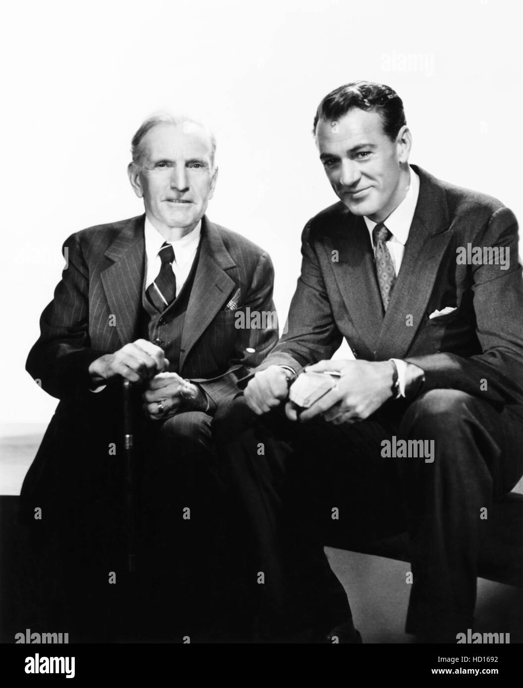 Gary Cooper (right) with his father Judge Charles Cooper on the set of ...