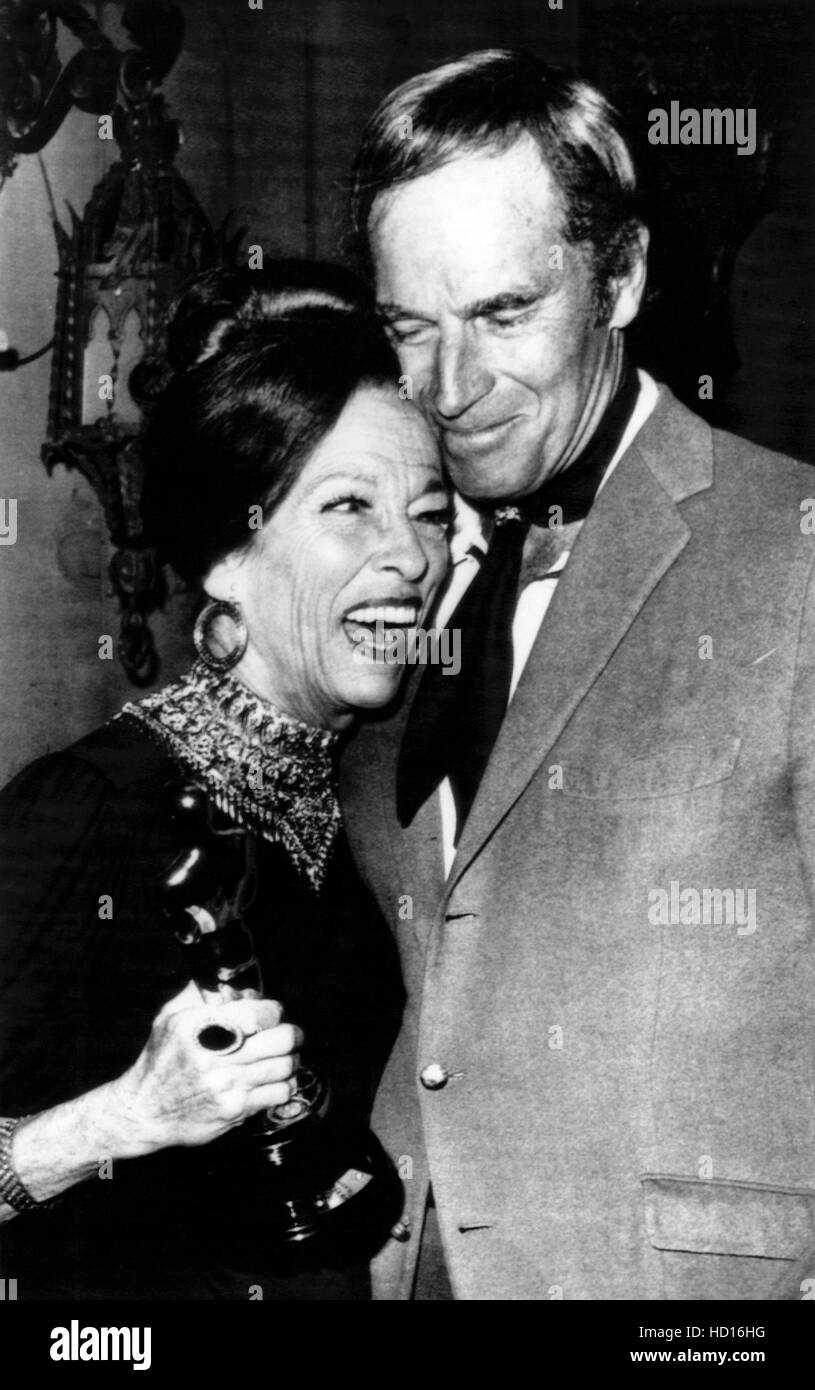 From left: Gale Sondergaard giving Charlton Heston a hug after ...