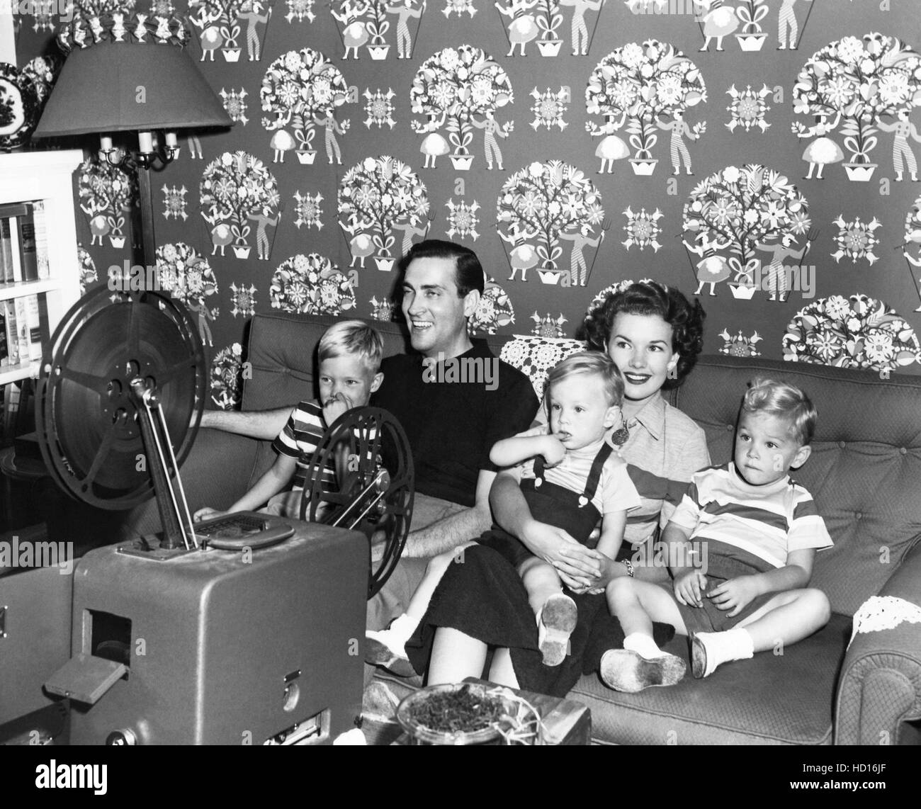 Lee Bonnell, Gale Storm, with their sons Phillip, Peter, Paul, watching ...