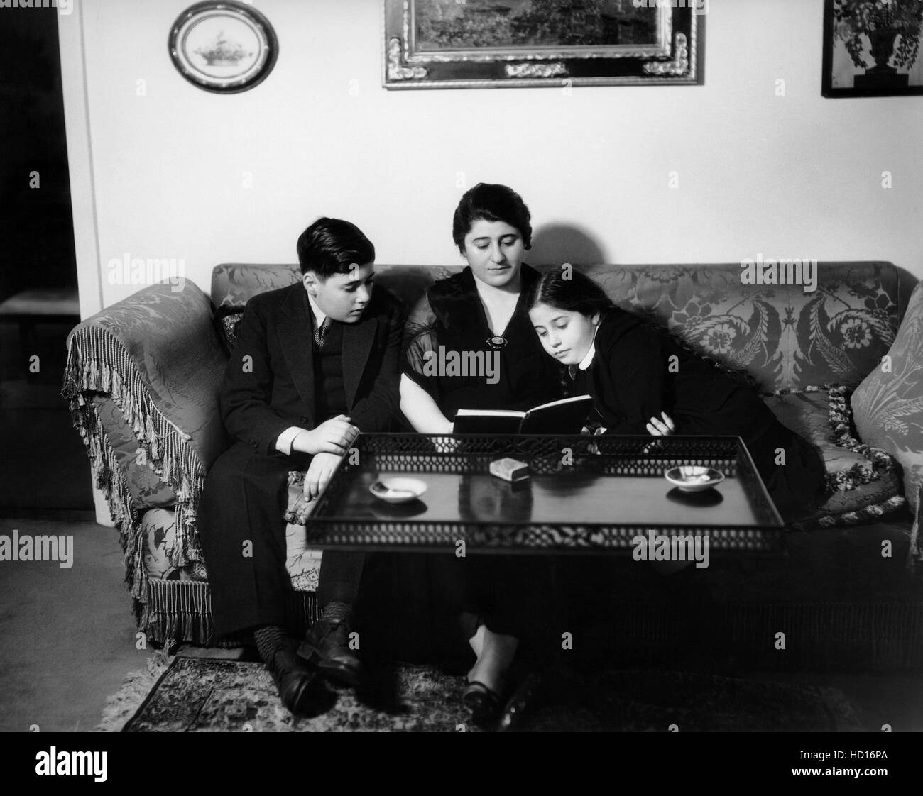 Gertrude Berg, at home with her children, from left, Cherney Berg and ...