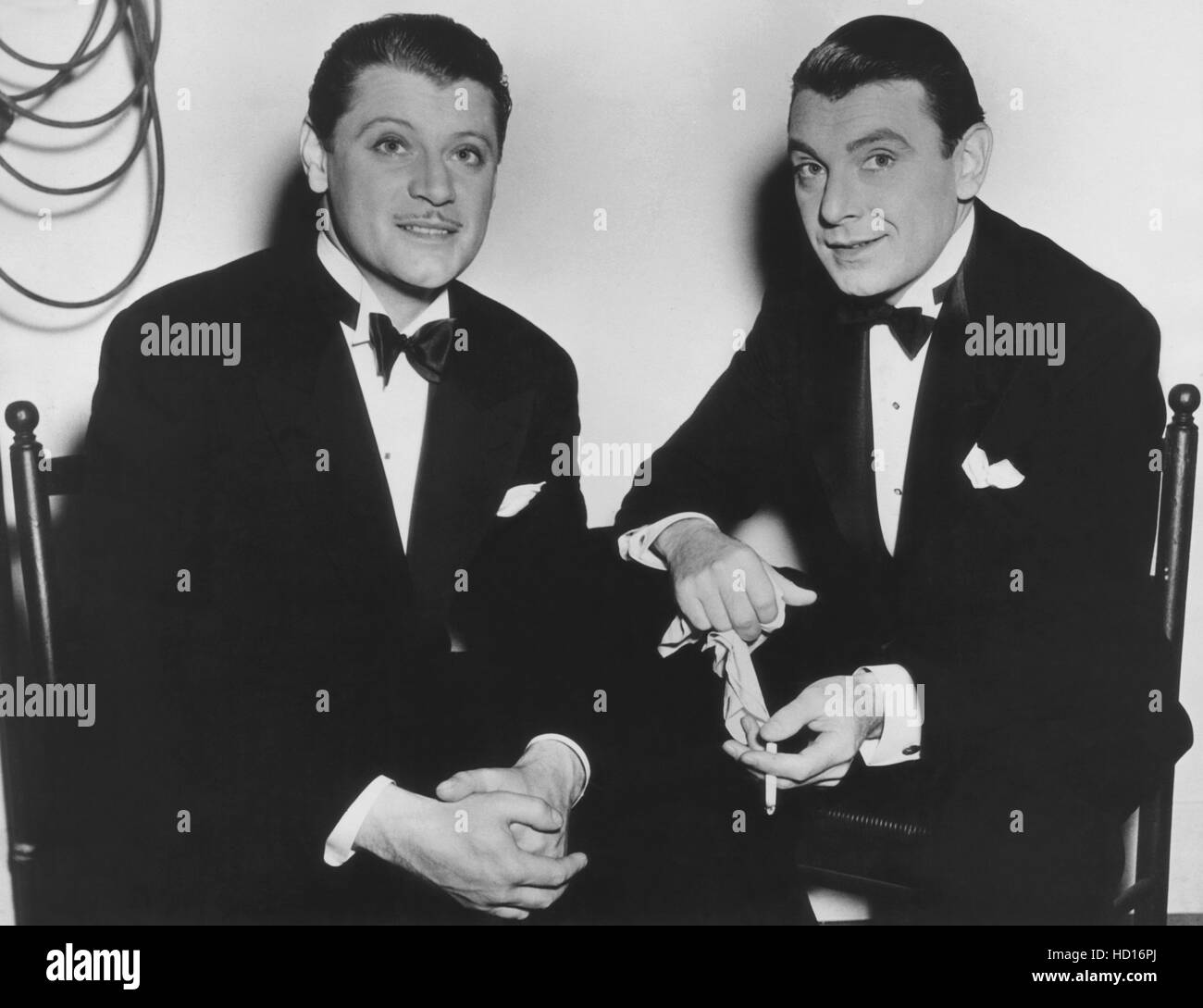 From left: Ralph Forbes, George Brent, mid 1930s Stock Photo - Alamy