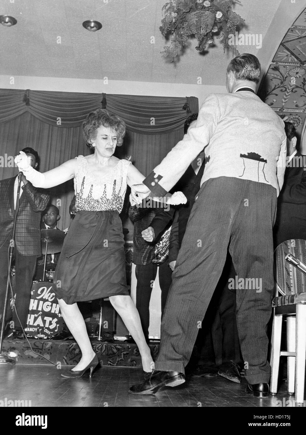 Hermione Gingold (left) doing the twist at a party held in the Hotel ...
