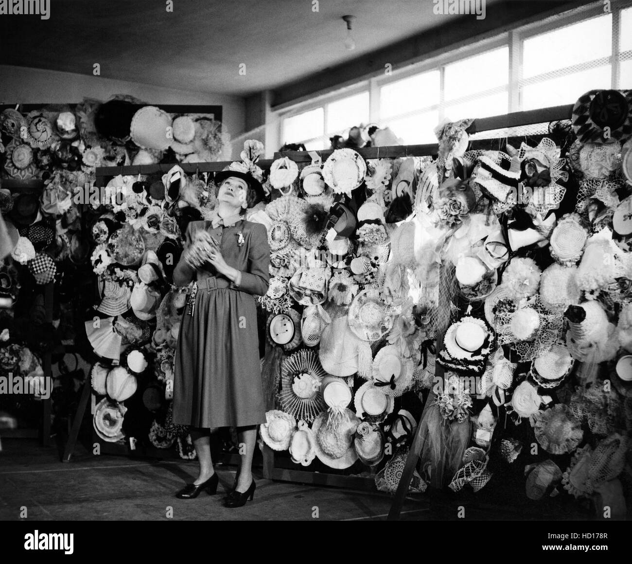 Hedda Hopper, amongst her many hats, ca. late 1940s Stock Photo - Alamy