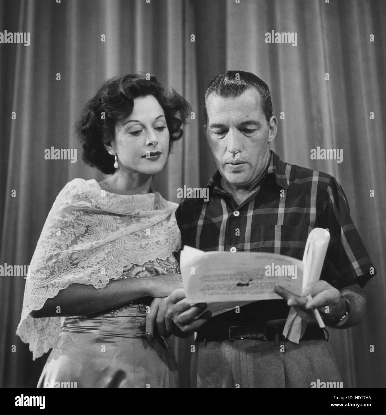 From left: Hedy Lamarr, Ed Sullivan examing a script, 1950s Stock Photo ...
