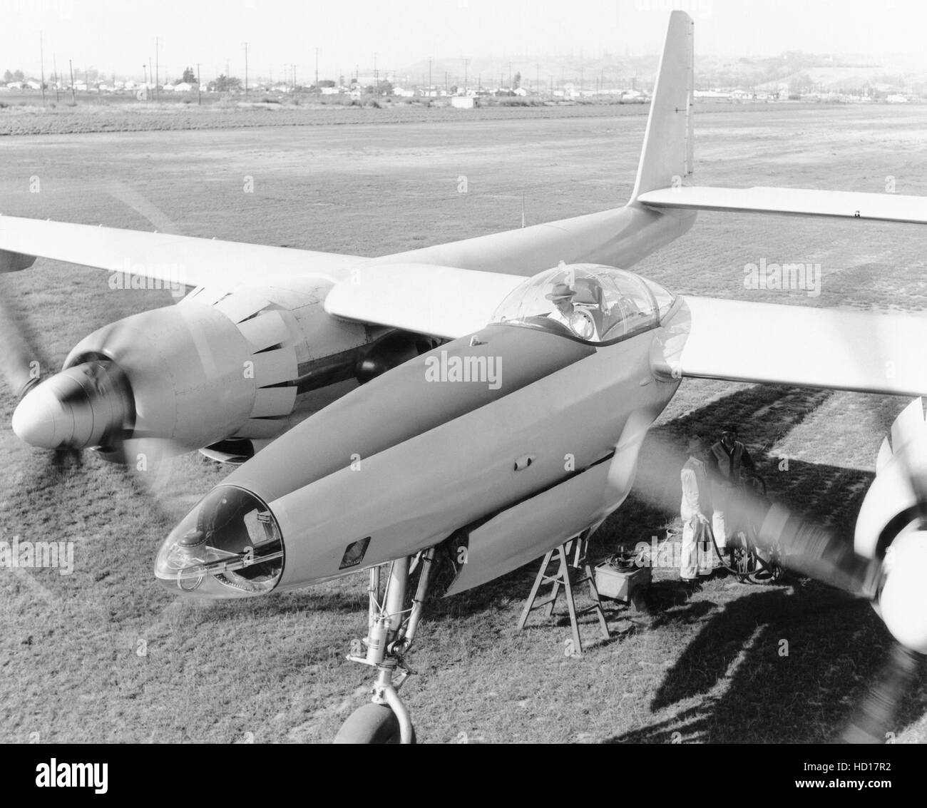 Howard Hughes, in the cockpit of his XF-11 reconnaissance plane, mid ...