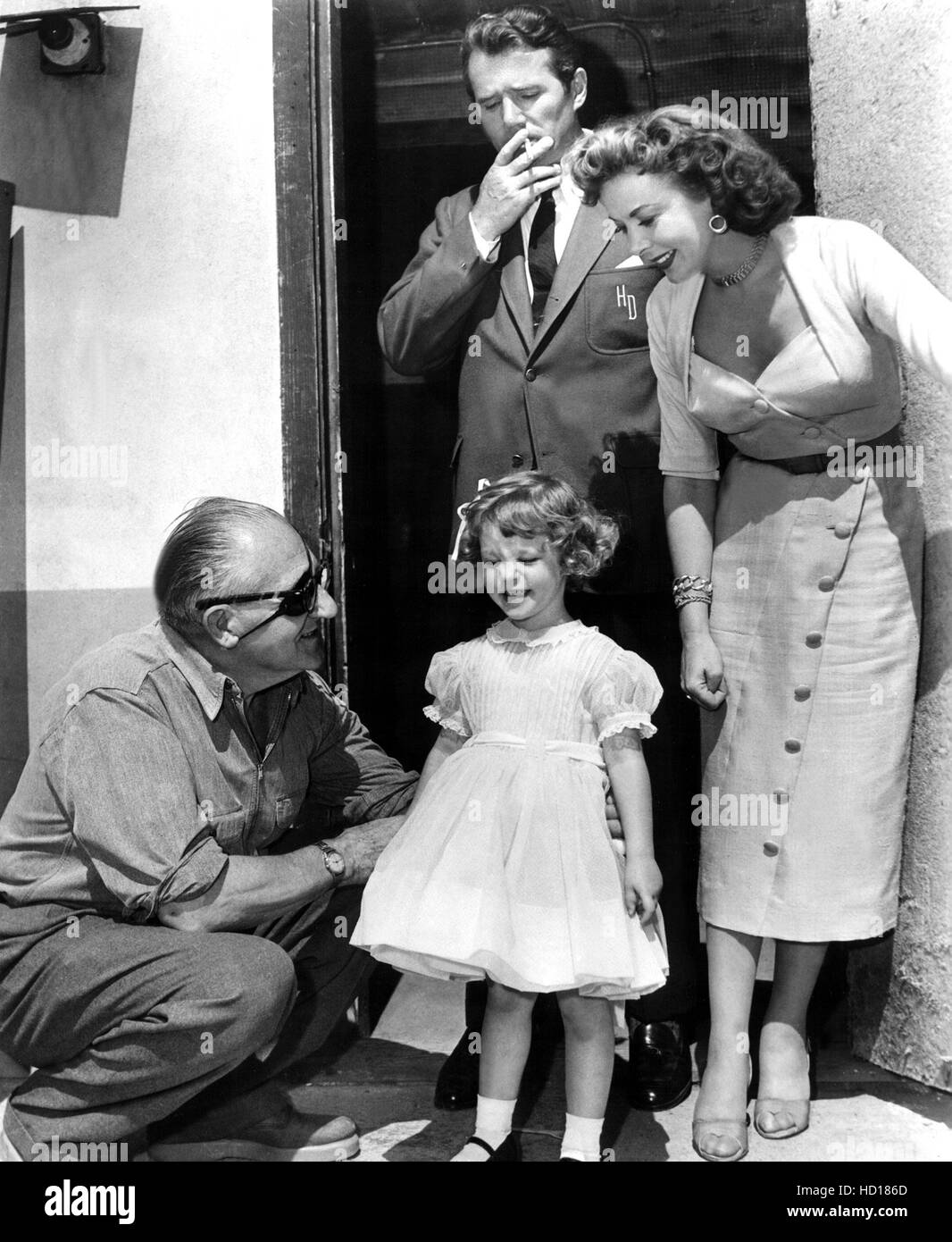 IDA LUPINO, with (l to r) director Fritz Lang, husband Howard Duff, and ...