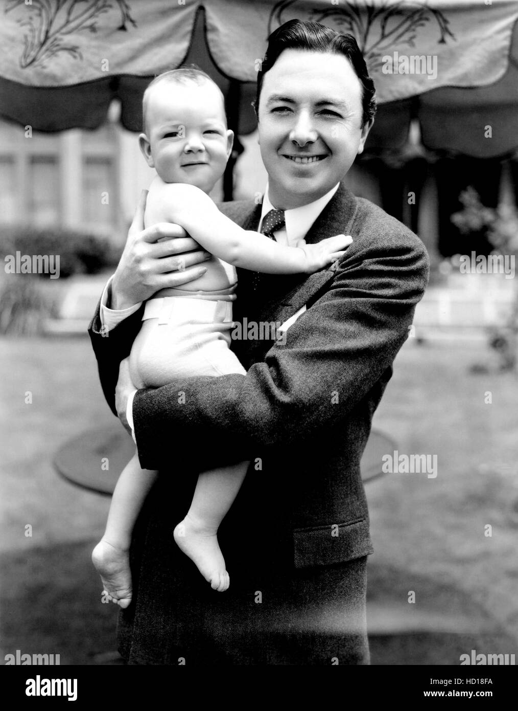 From left: Jack Haley, Jr. with father, Jack Haley, 1934 Stock Photo ...