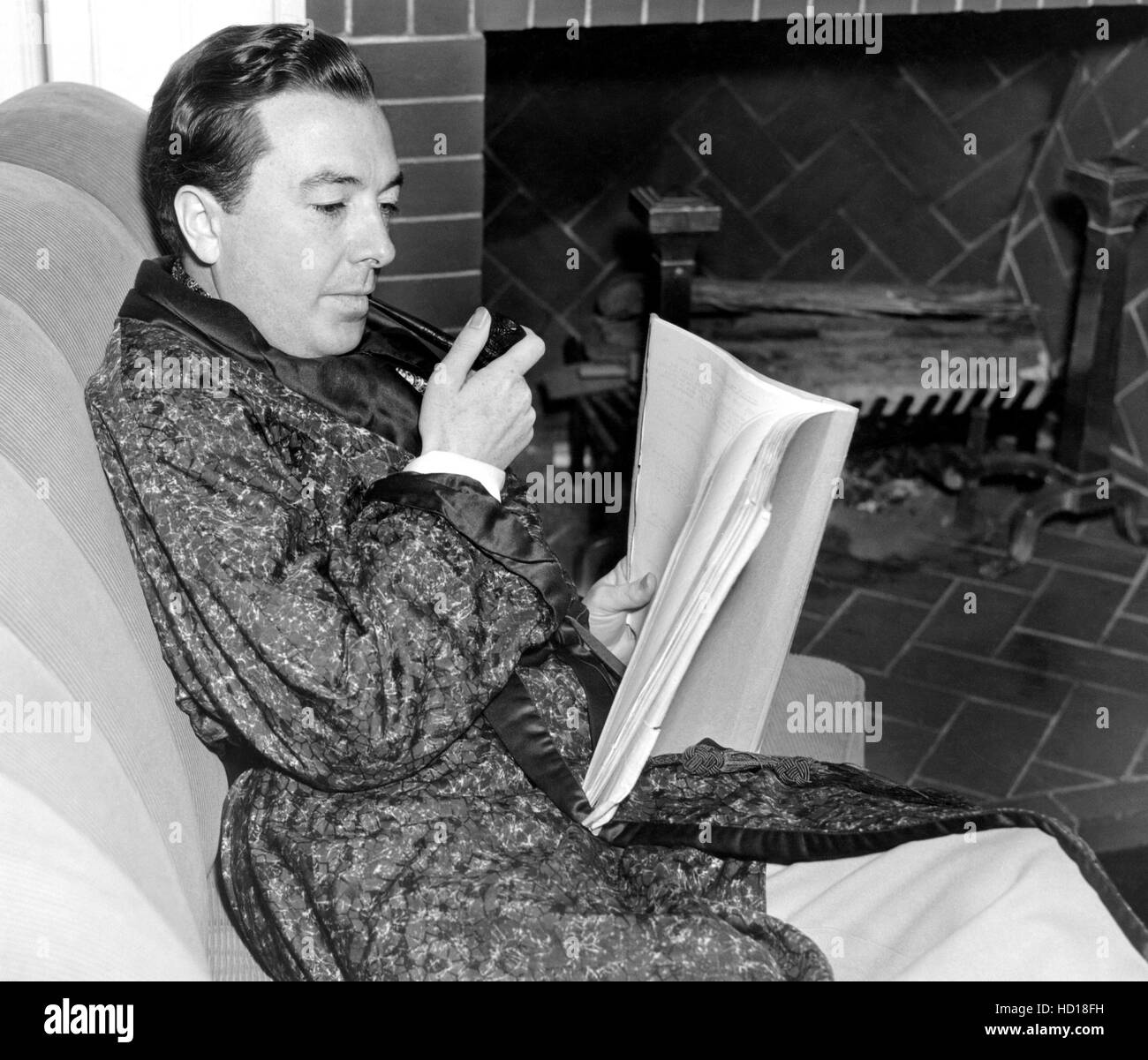 Jack Haley reading script at home, ca. early 1940s Stock Photo - Alamy