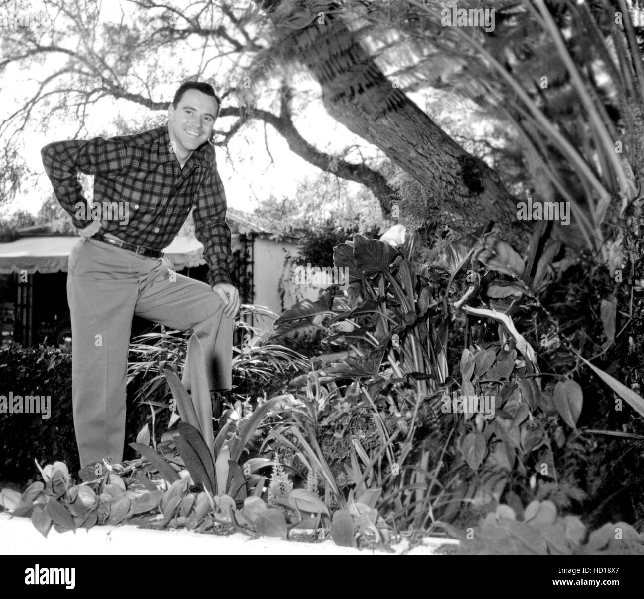 Jack Lemmon, in his back yard, 1955 Stock Photo - Alamy