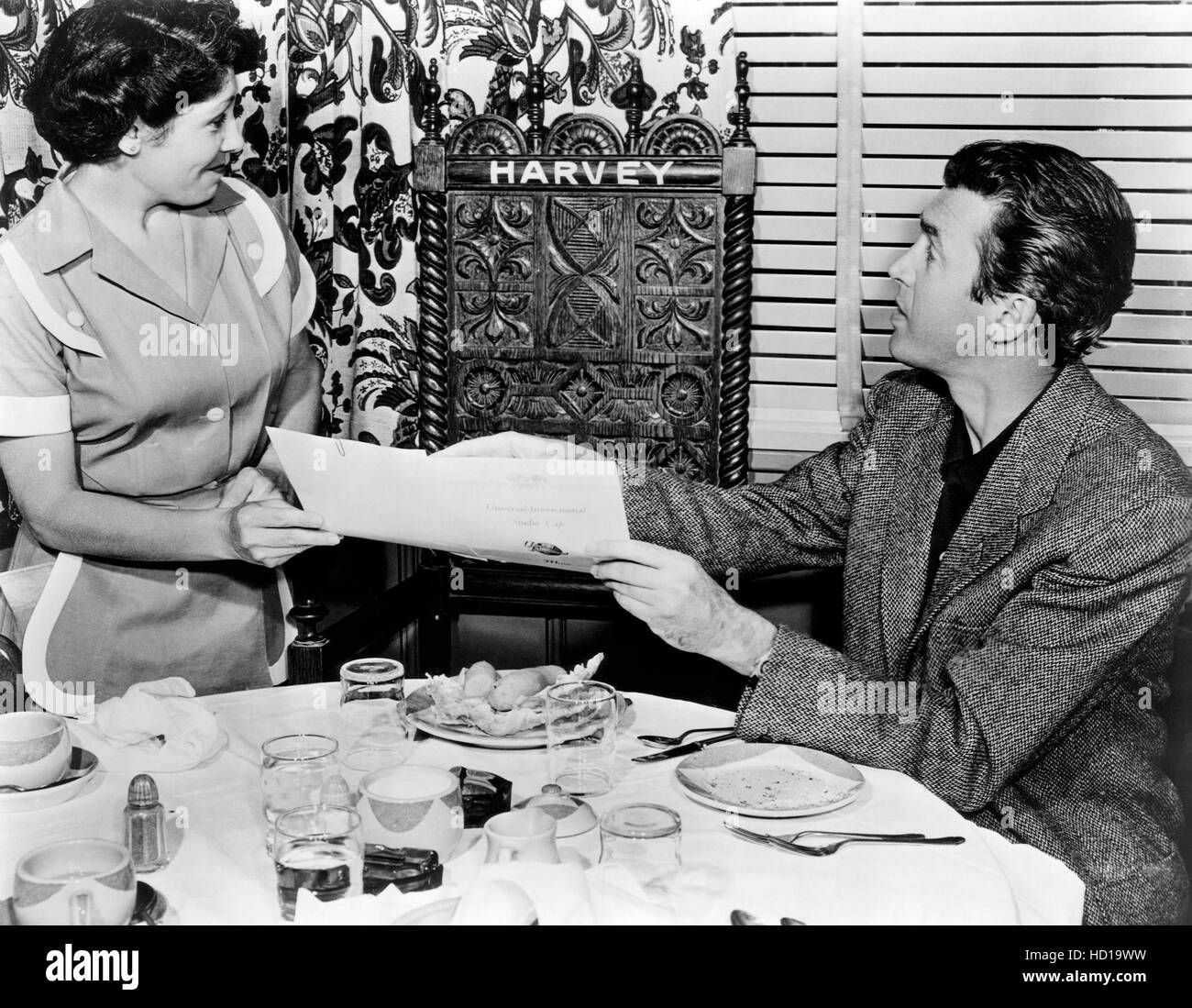 James Stewart takes his invisible rabbit friend out to lunch while ...