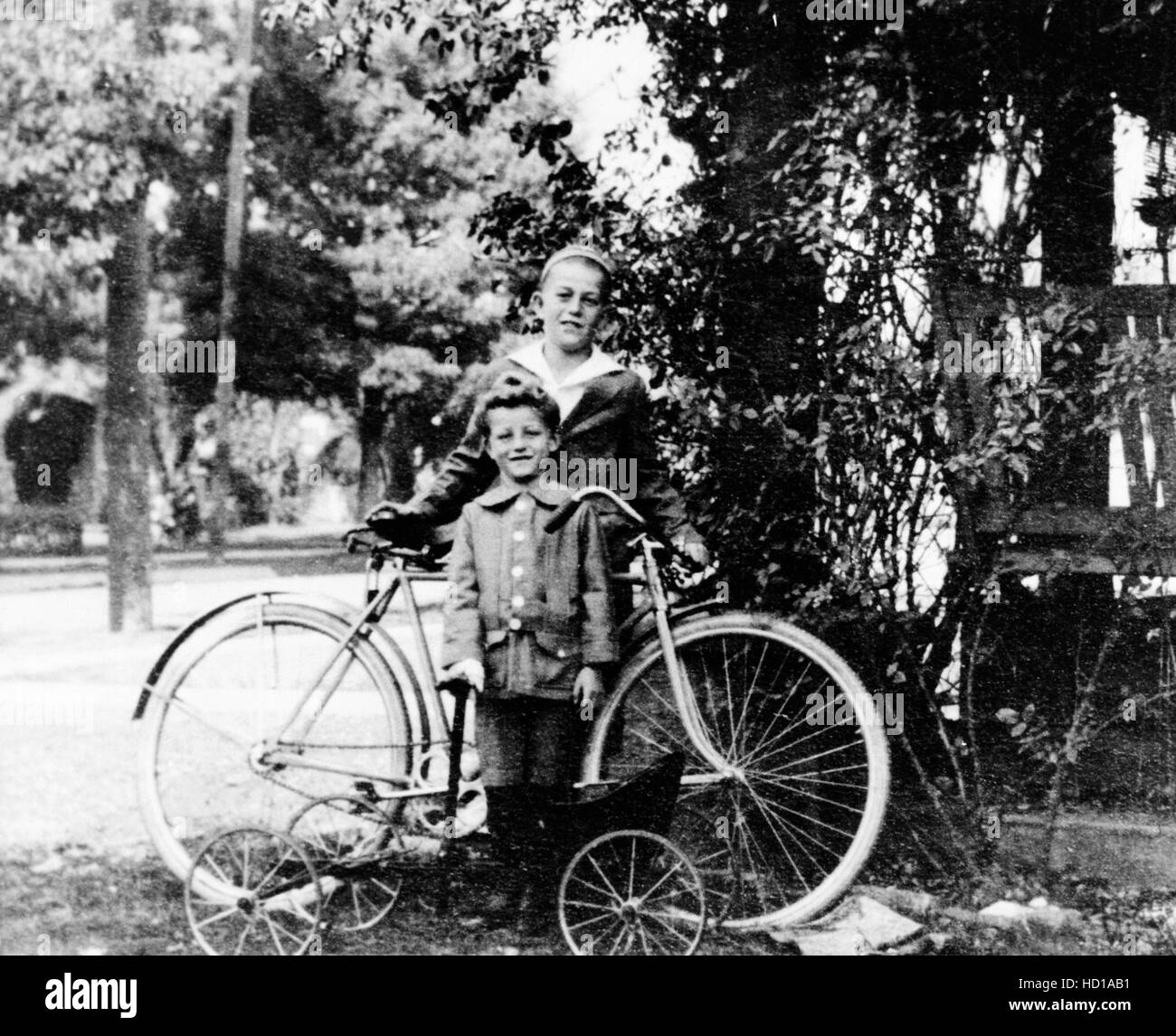 John Wayne, (back), aged 11, with his younger brother, Robert Wayne ...