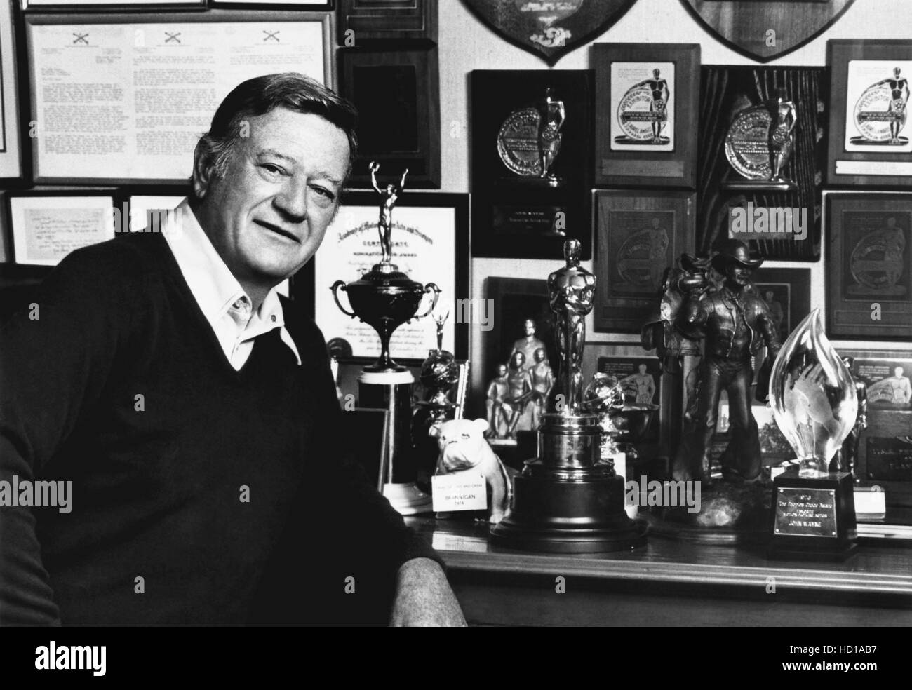 John Wayne, at home with his many trophies, 1976 Stock Photo - Alamy