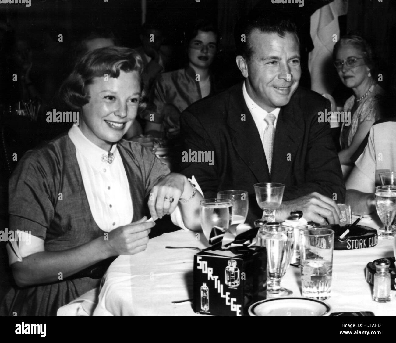 Happily marrieds JUNE ALLYSON and DICK POWELL enjoy an evening at New ...