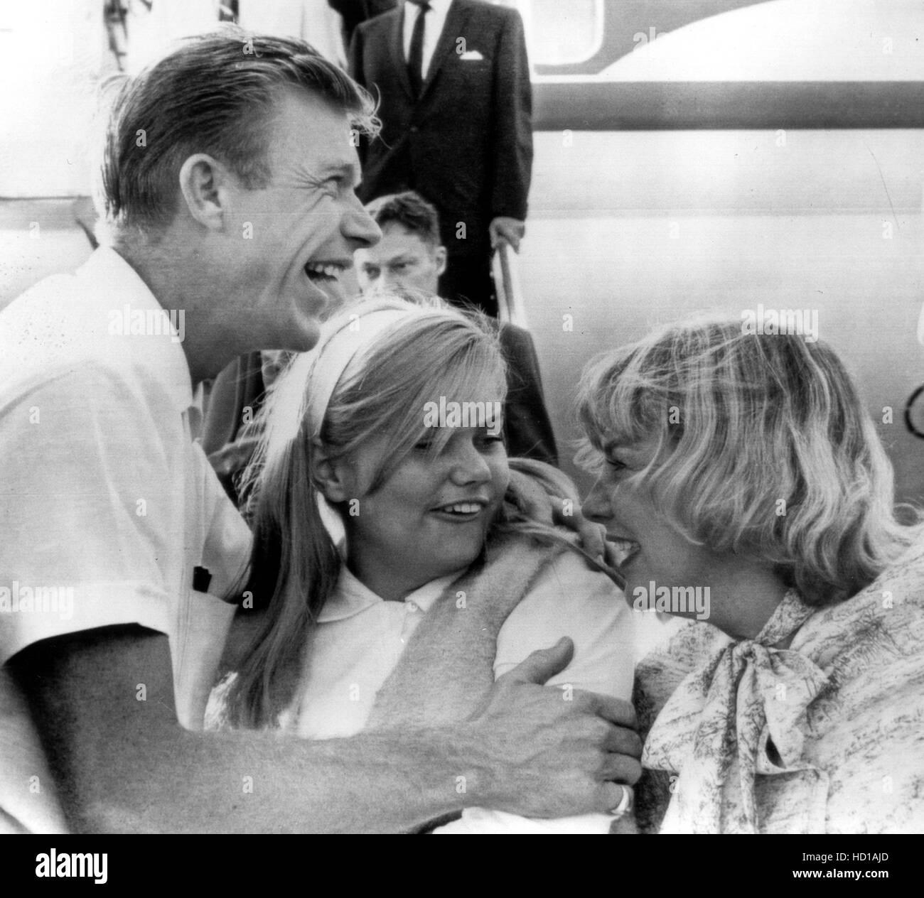 Husband and wife to be GLENN MAXWELL [L] and JUNE ALLYSON [R] greet the ...