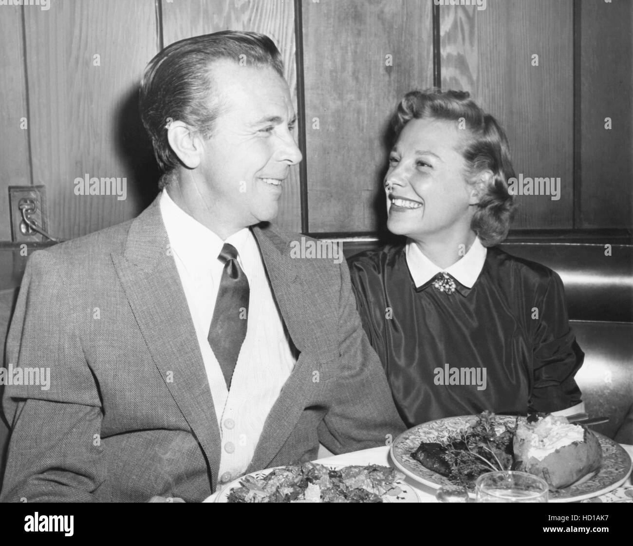 Dick Powell (left) and June Allyson having dinner at The Fox and Hounds ...