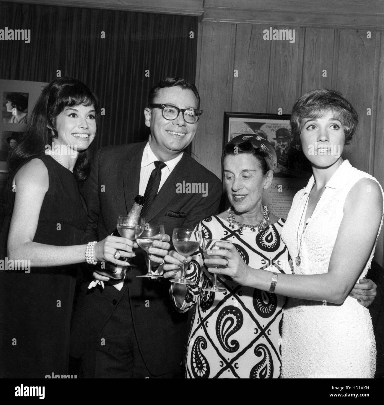 Mary Tyler Moore, Ross Hunter, Bea Lillie, Julie Andrews toasting ...