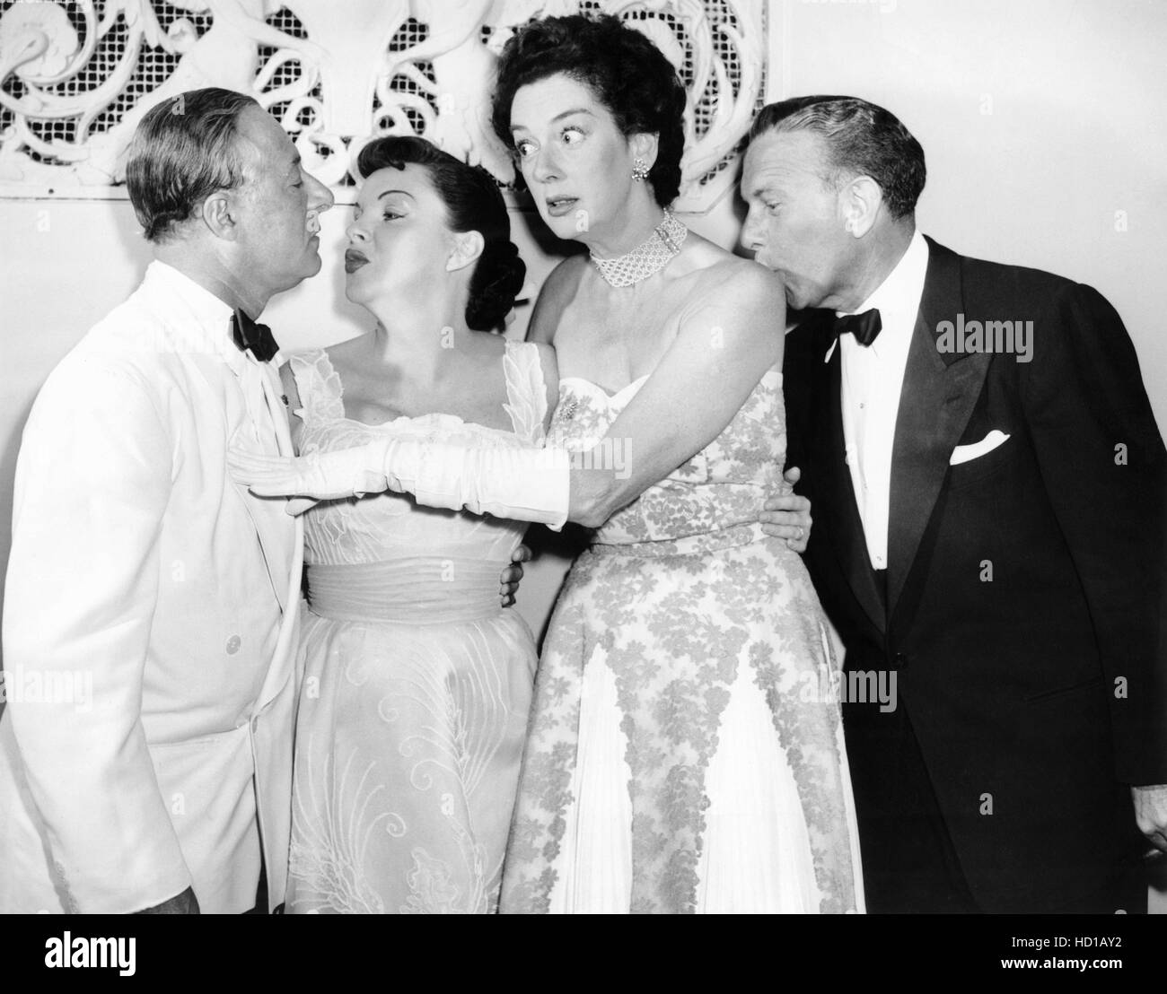 From left, George Jessel, Judy Garland, Rosalind Russell, George Burns ...