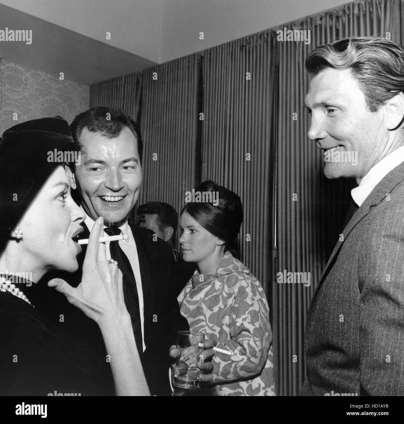 From left, Judy Garland, her fourth husband, Mark Herron, Jack Palance ...