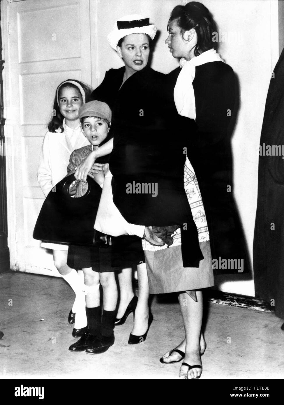 From left, Lorna Luft, Joey Luft, Judy Garland, Liza Minnelli, arriving ...