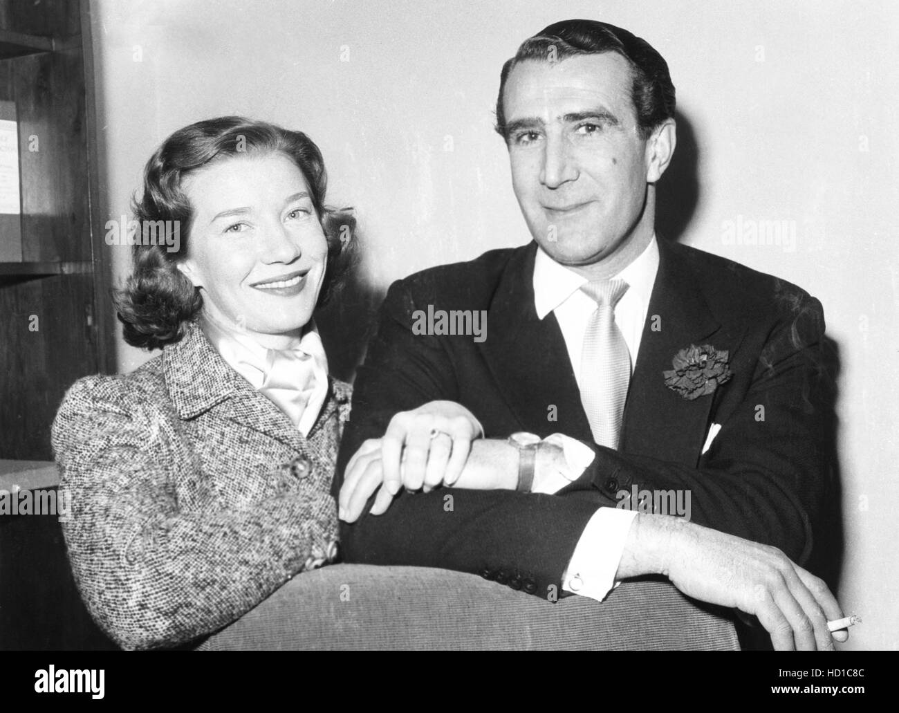 Lois Maxwell (left) showing her diamond and sapphire engagement ring ...