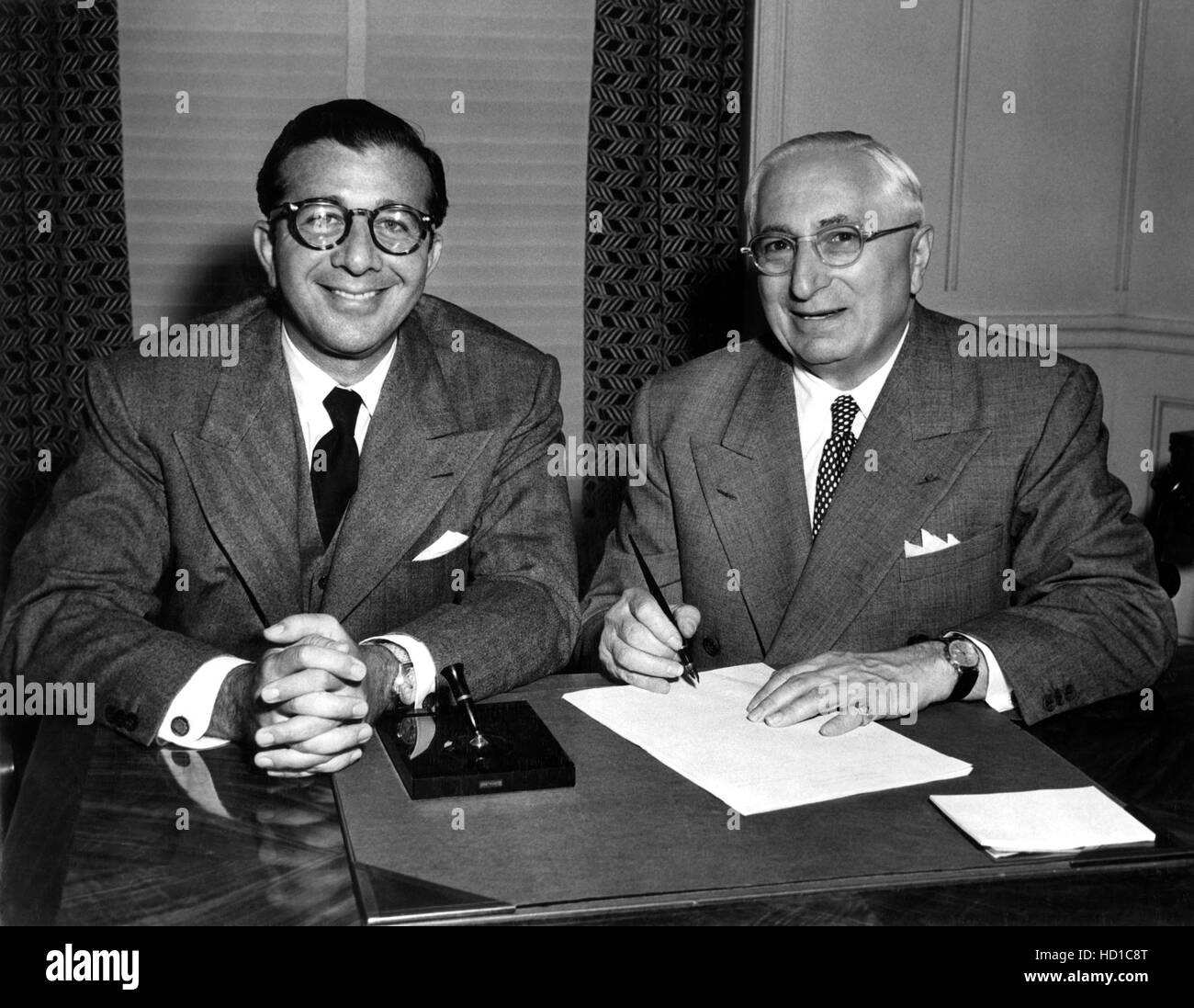 Louis B. Mayer, Head of MGM Studios, and Dore Schary signing agreement ...