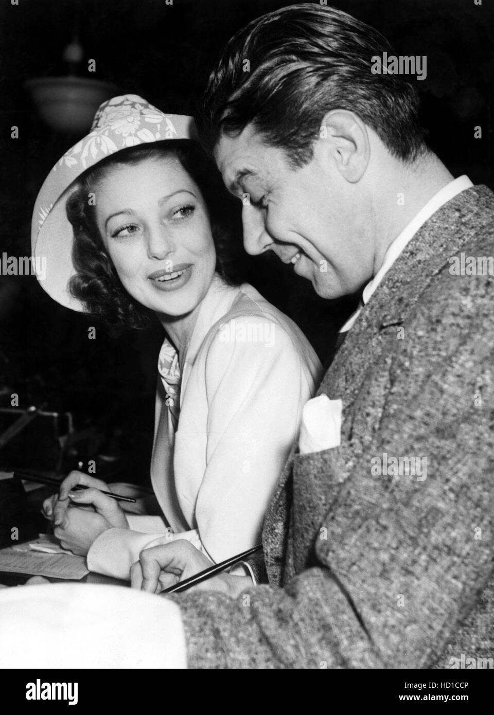 LORETTA YOUNG and ad exec TOM LEWIS register at the L.A. marriage ...