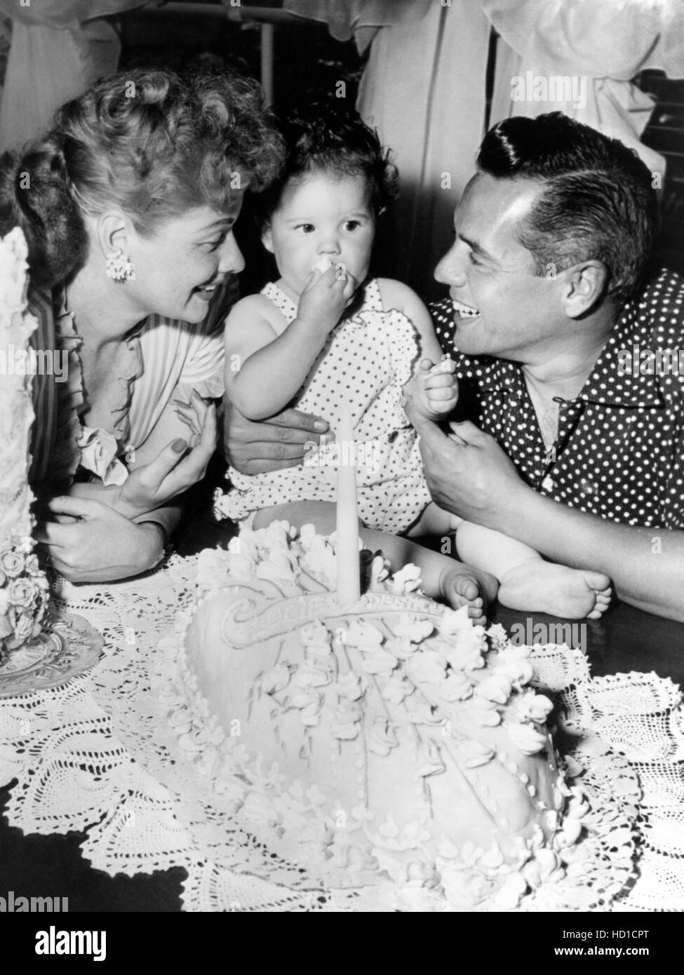 Lucille Ball, Lucie Arnaz, Desi Arnaz, celebrating baby Lucie's first ...