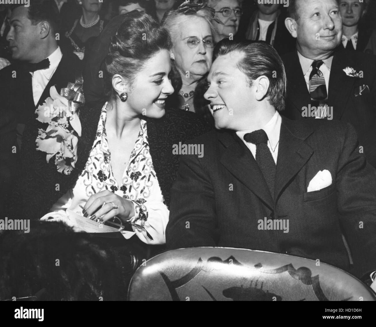 Mickey Rooney with Ramsay Ames attending the premiere of 'The Sullivans ...