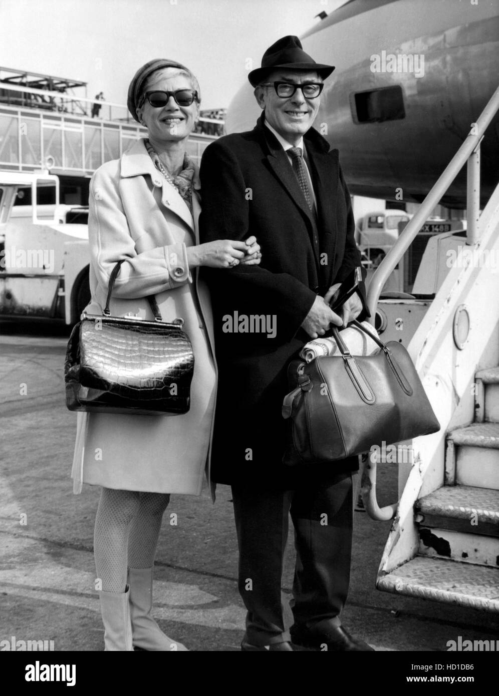 From left: Margaret Leighton, Michael Wilding, at London's Heathrow ...