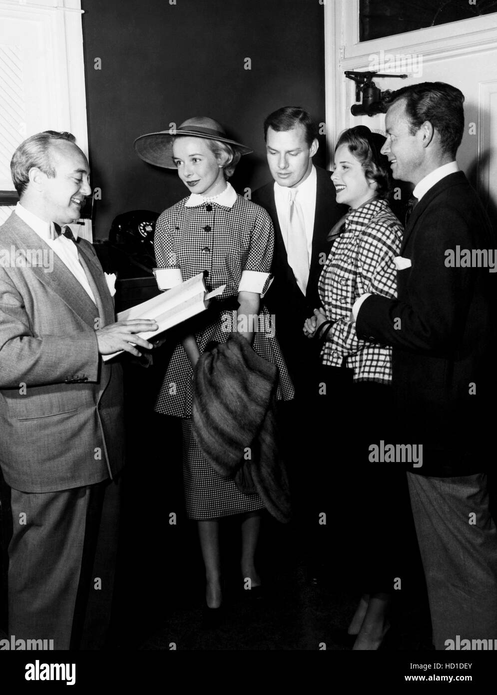 Harry Pierce, owner of Perry Steak House, left, greets guests (from ...