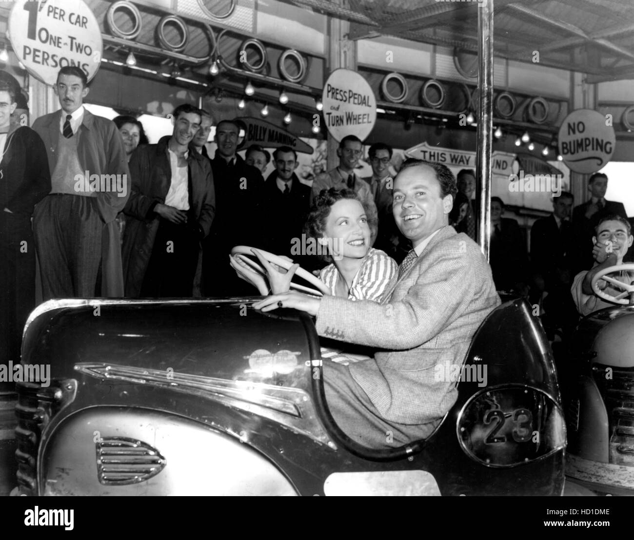 Muriel Pavlow, left, and husband Derek Farr, riding the bumper-cars ...