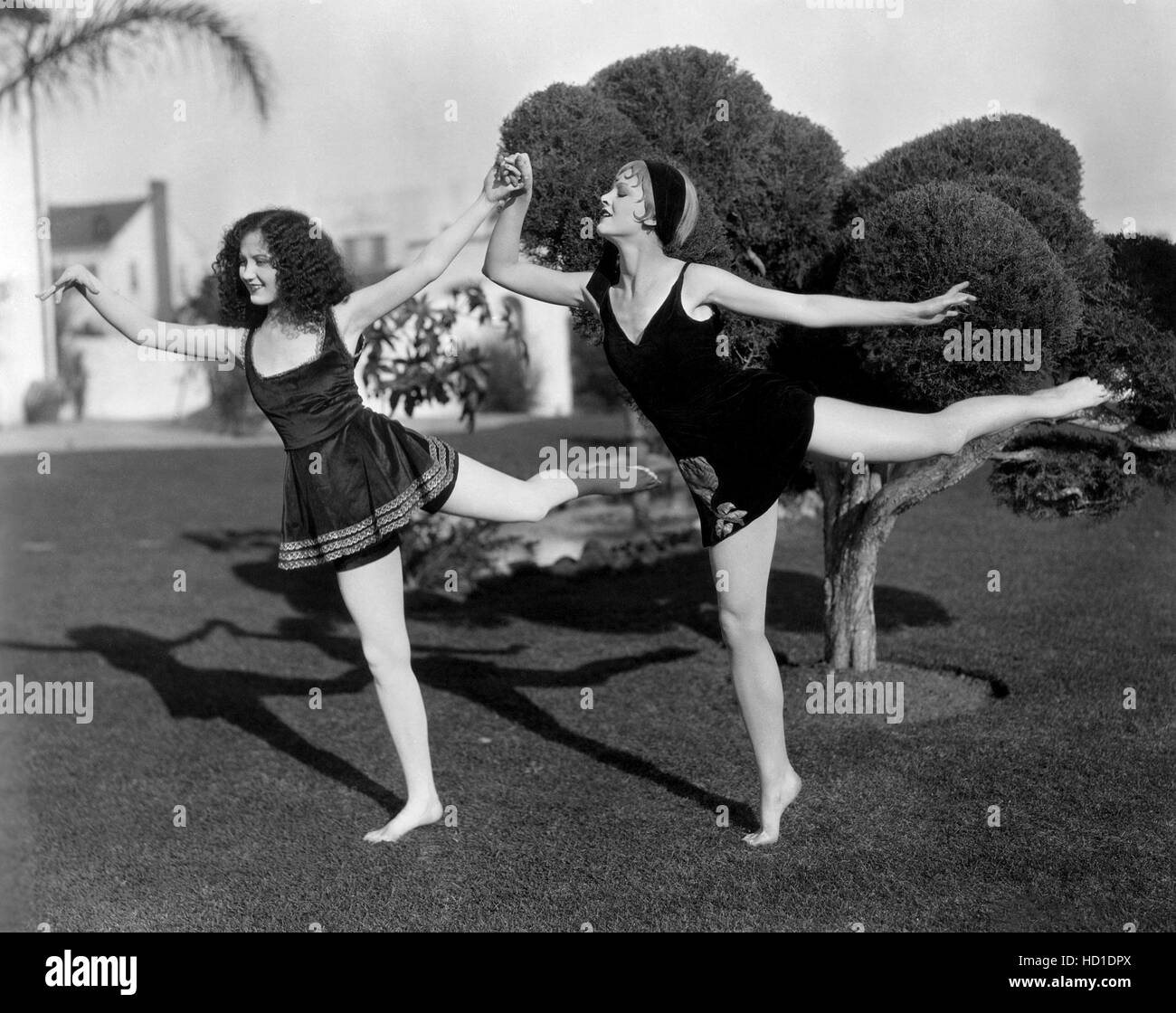 Warner Brothers starlets DORIS HILL and MYRNA LOY celebrate Spring, 4 ...