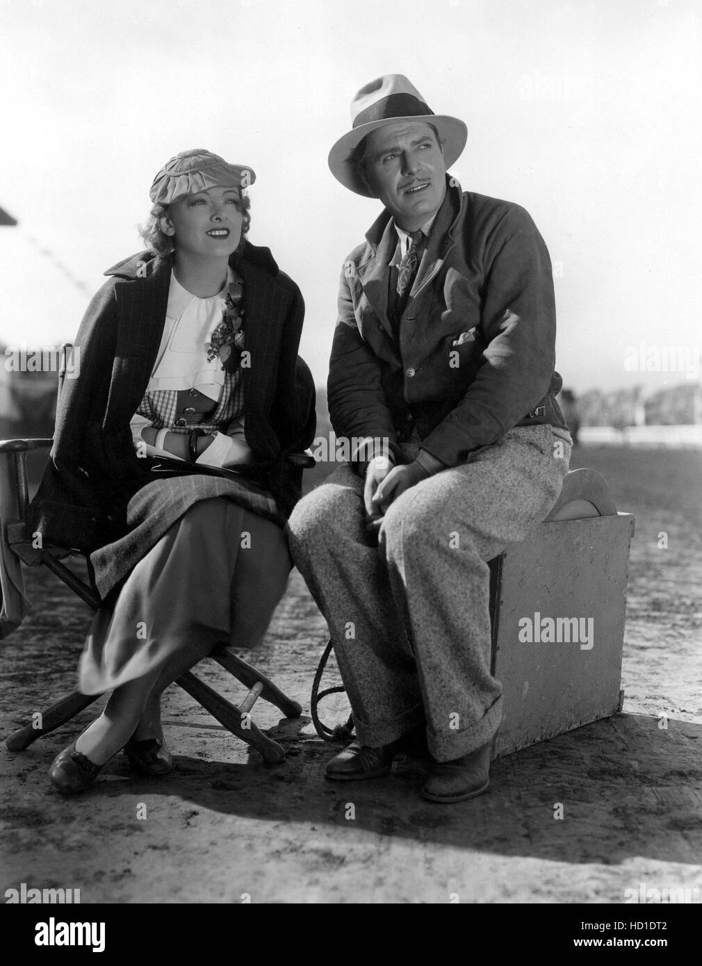MYRNA LOY and co-star WARNER BAXTER, on location for BROADWAY BILL ...