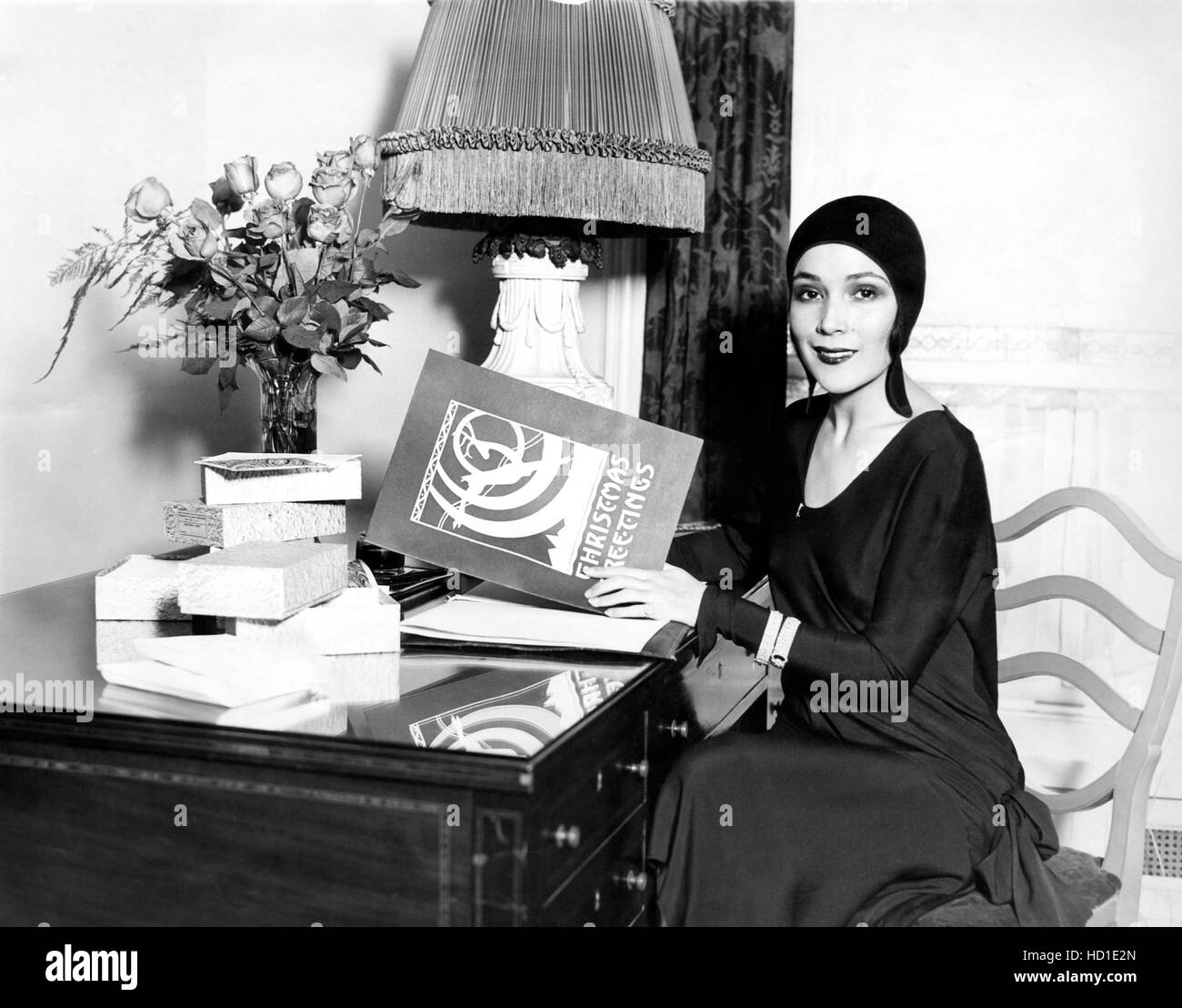 Dolores del Rio with a Christmas card of her own design, 1928 Stock ...