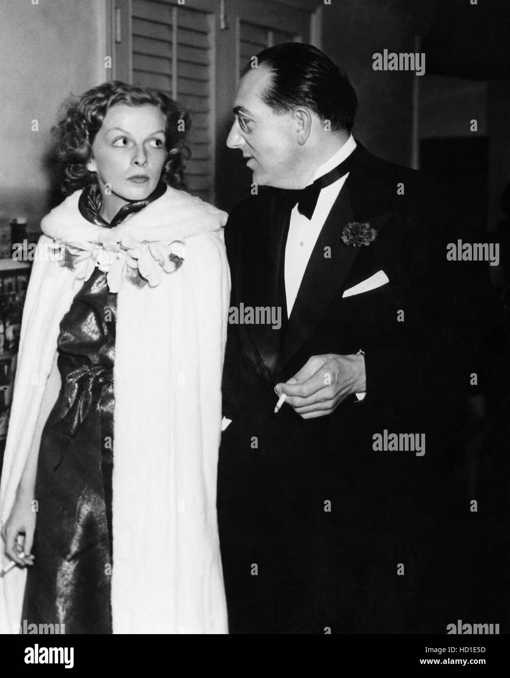 From left, Doris Dudley, Fritz Lang, at the Trocadero, 1936 Stock Photo ...