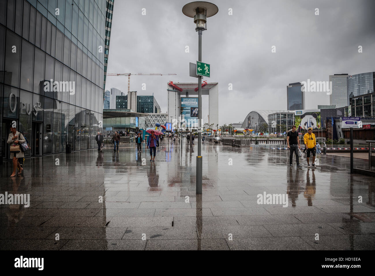 Business people go to work on a rainy day in Paris Stock Photo - Alamy