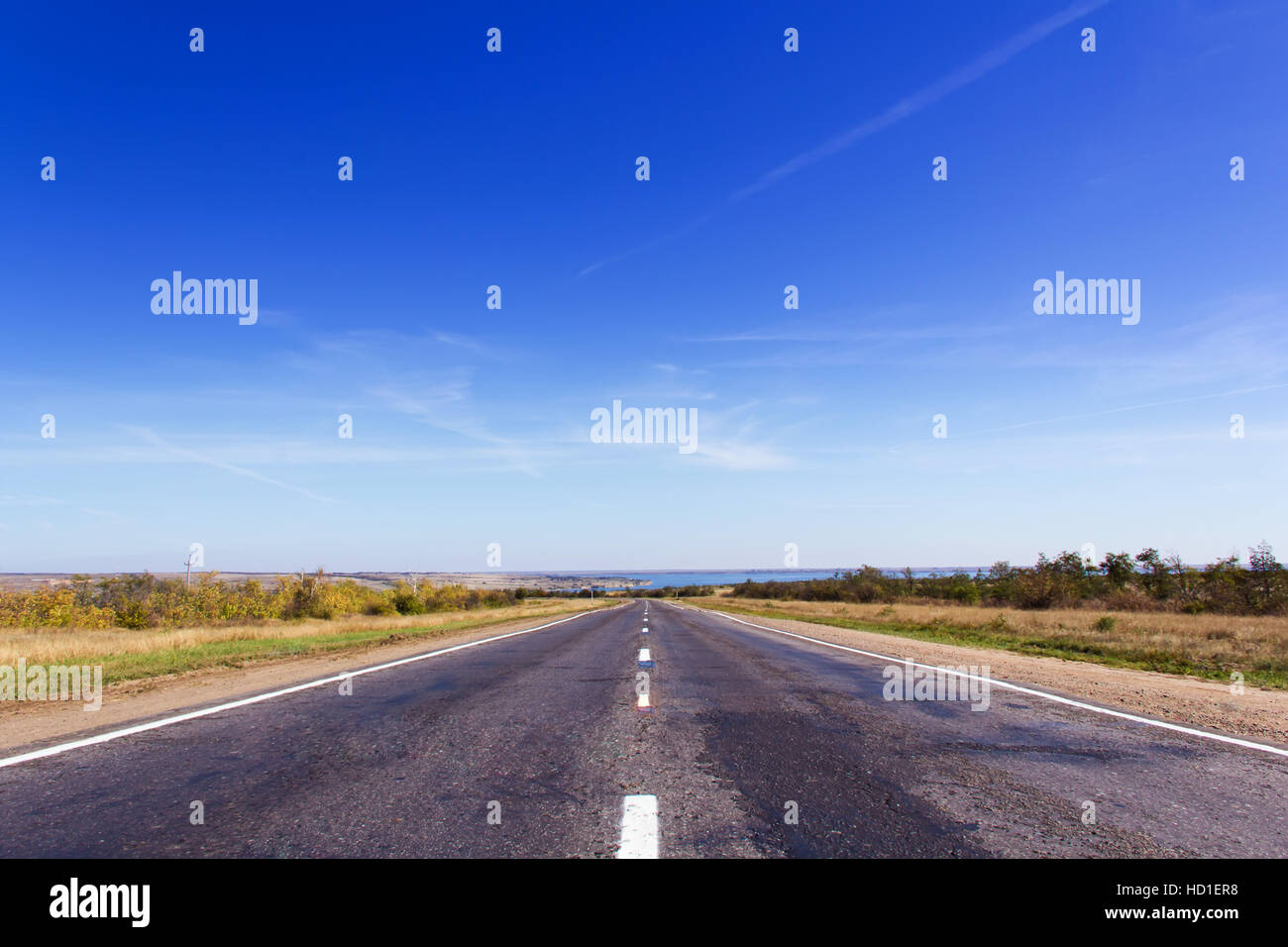 Photo of day landscape with road perspective Stock Photo - Alamy
