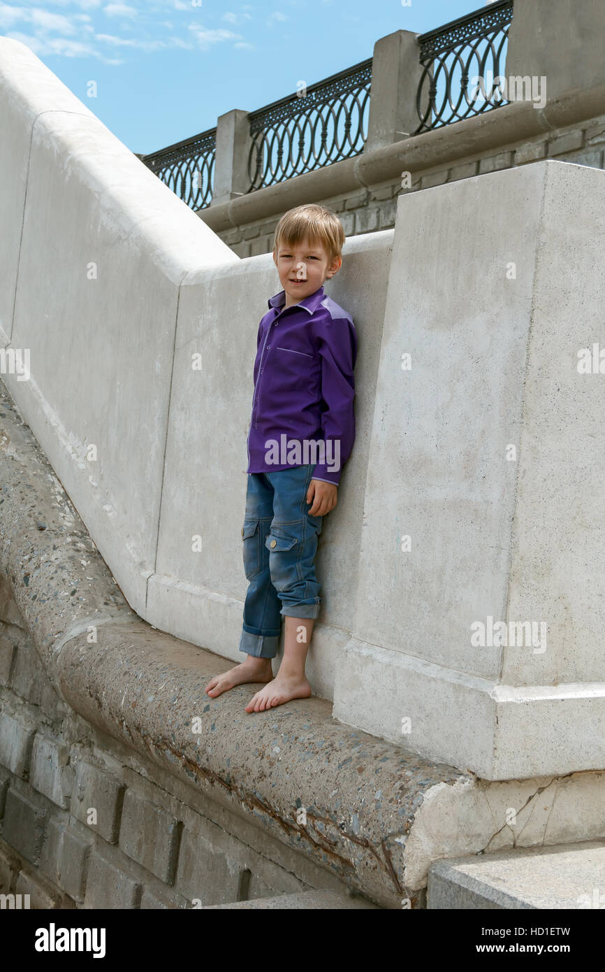 Barefoot schoolboy hi-res stock photography and images - Alamy